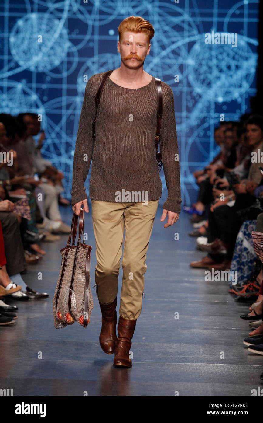 A model wears a creation by designer Paul Smith for his Men's Spring ...