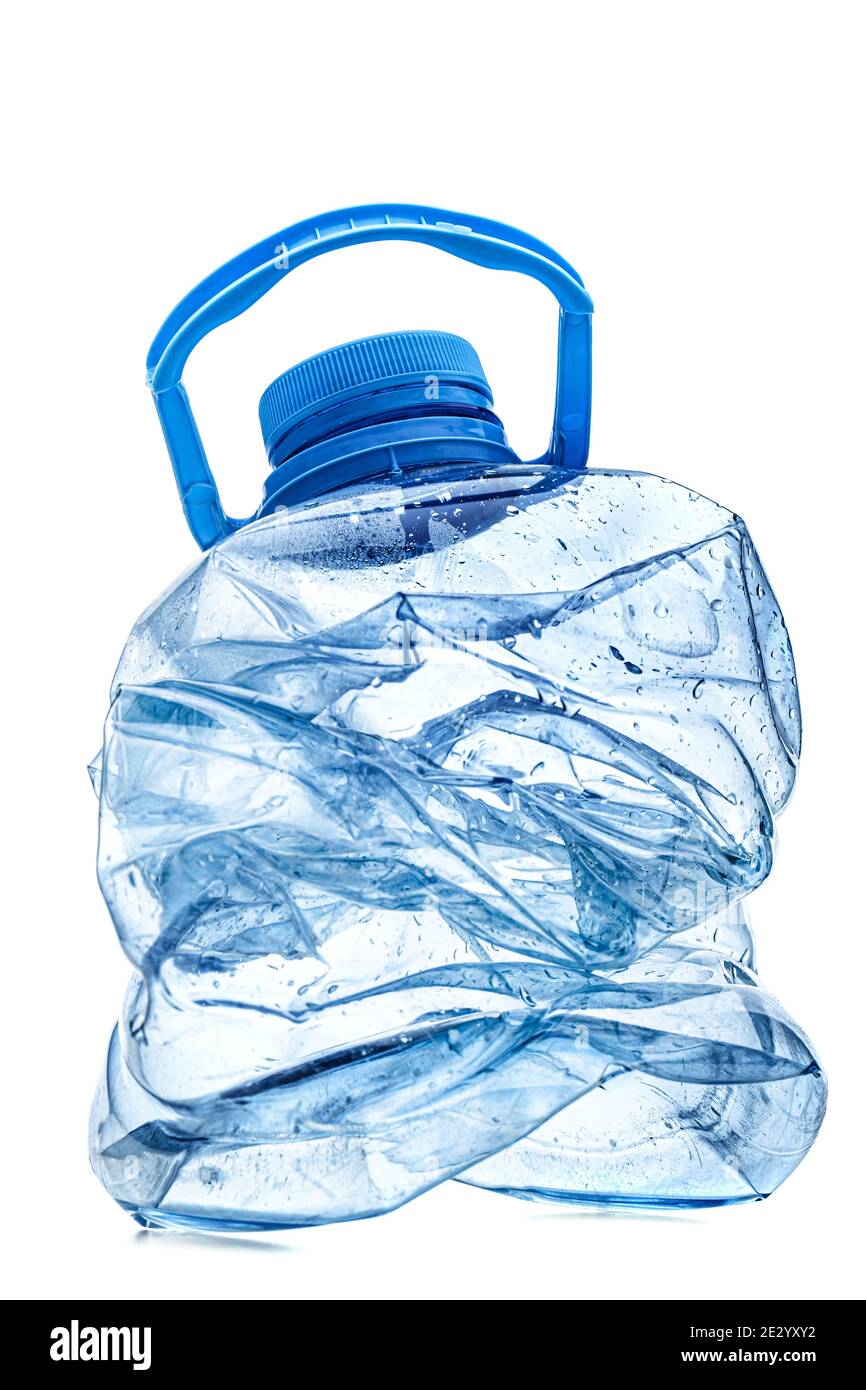 smashed empty plastic bottle with blue cap, isolated on white ...