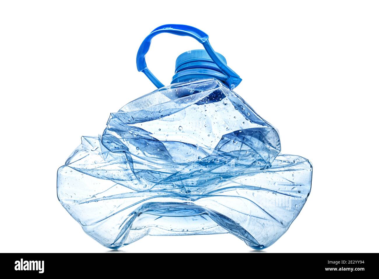 smashed empty plastic bottle with blue cap, isolated on white ...