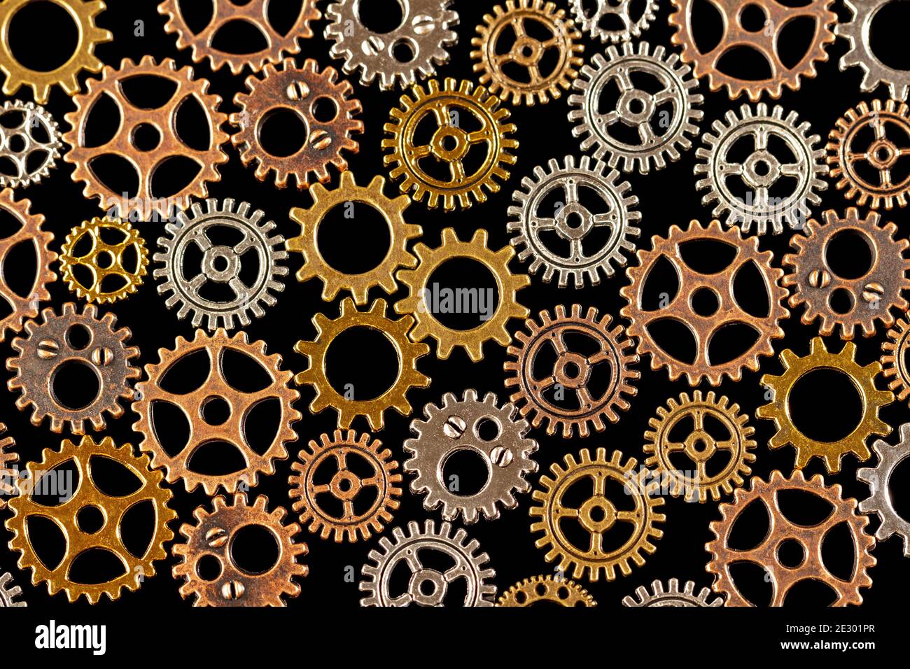 Gears abstract background. Products made of different metals. Macro ...