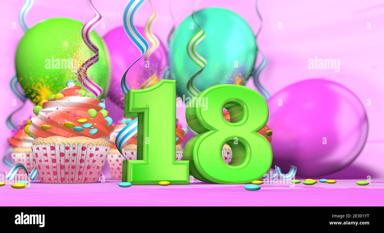 Birthday cupcake with sparking candle with the number 18 large in green ...