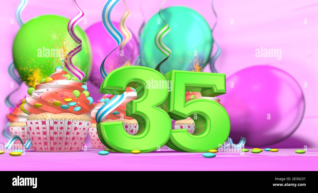 Birthday cupcake with sparking candle with the number 35 large in green ...