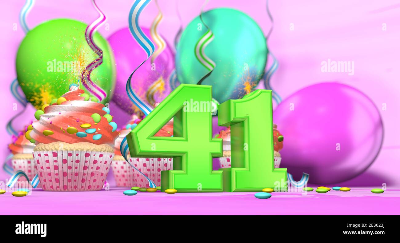 Birthday cupcake with sparking candle with the number 41 large in green ...