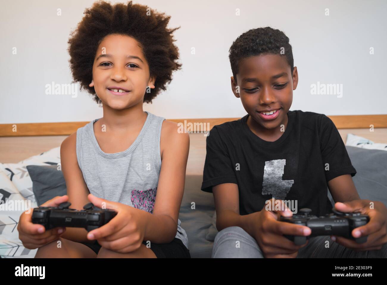 Two african american brothers play hi-res stock photography and images ...