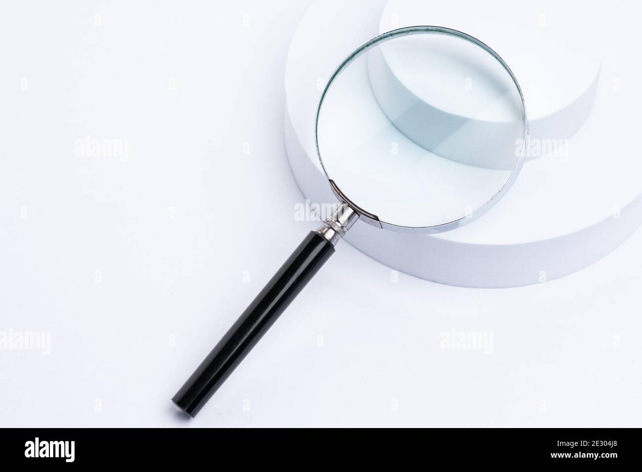 Magnifying glass on white background Stock Photo - Alamy