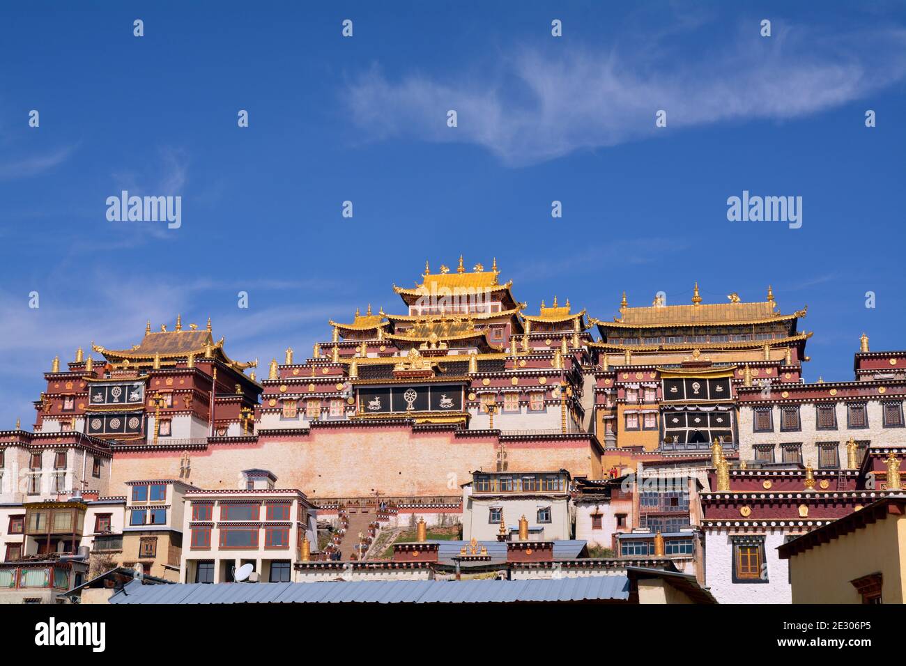 Sumtseling monastery high above the city of Shangri La, Yunnan province ...