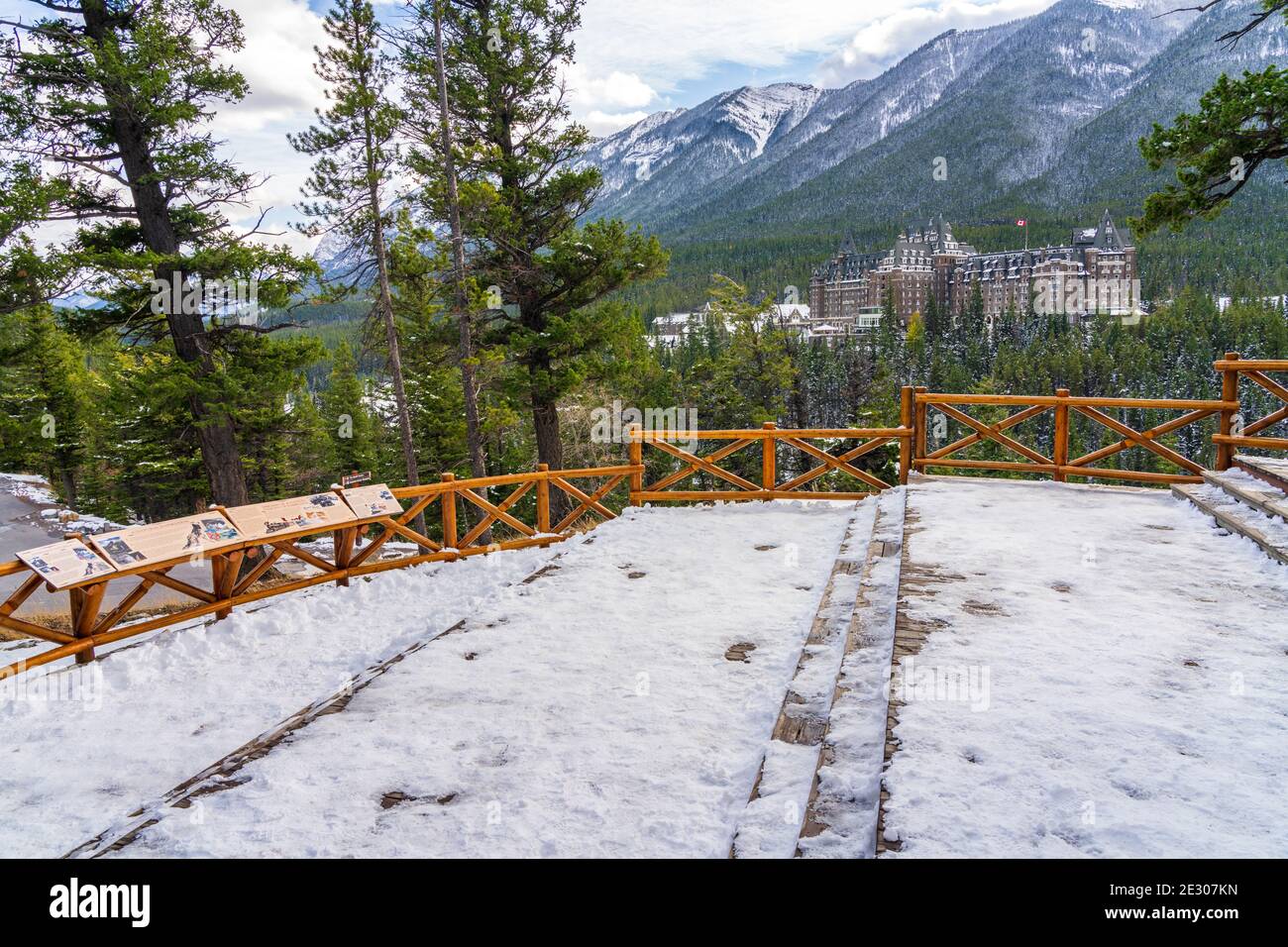Fairmont Banff Springs and Bow River Falls in snowy autumn sunny day ...