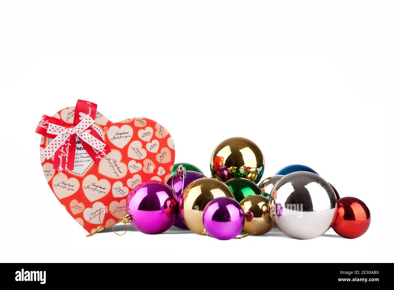 Heartshaped gift box,multicolored balls,close-up high quality photo ...
