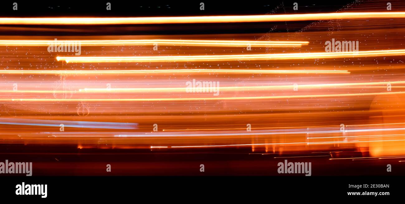 Abstract light trails on the dark background Stock Photo - Alamy