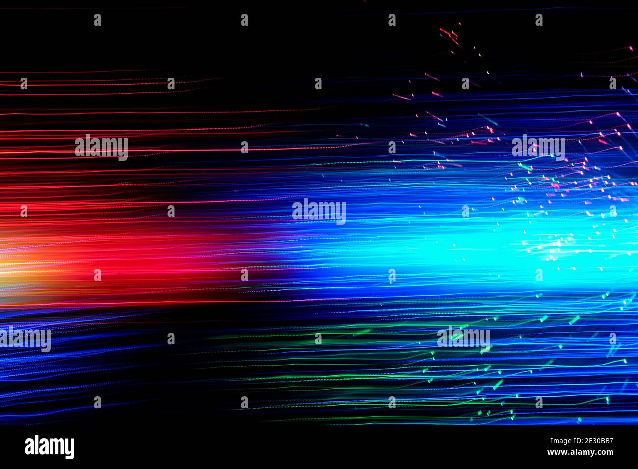 Abstract motion curved lights on dark background Stock Photo - Alamy