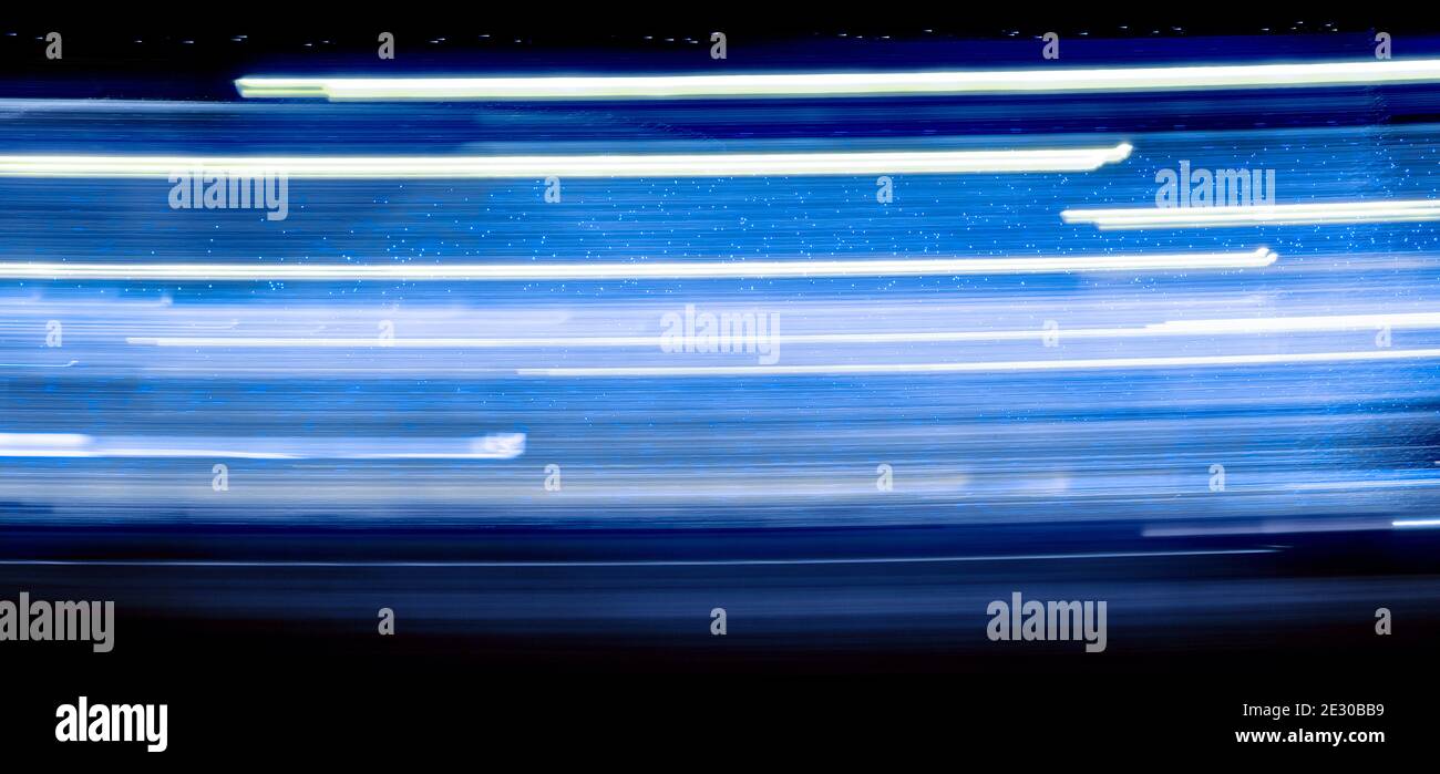 Abstract light trails on the dark background Stock Photo - Alamy