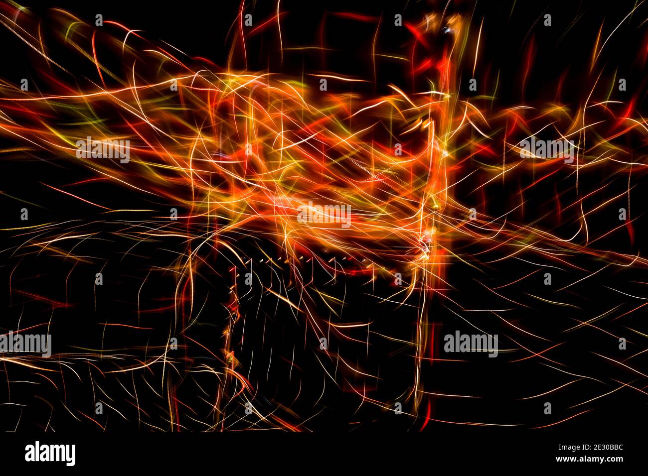 Abstract motion curved lights on dark background Stock Photo - Alamy