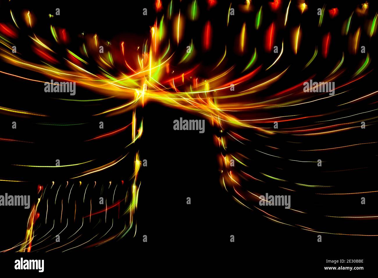 Abstract motion curved lights on dark background Stock Photo - Alamy