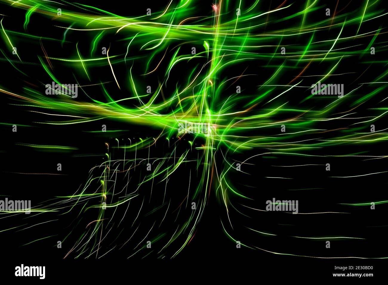 Abstract motion curved lights on dark background Stock Photo - Alamy