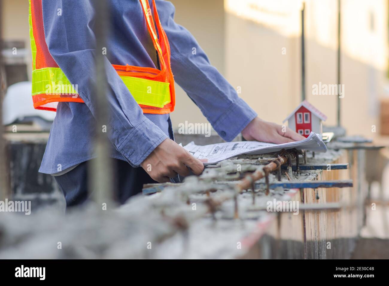 Engineer inspection on site building construction with blueprint Stock ...