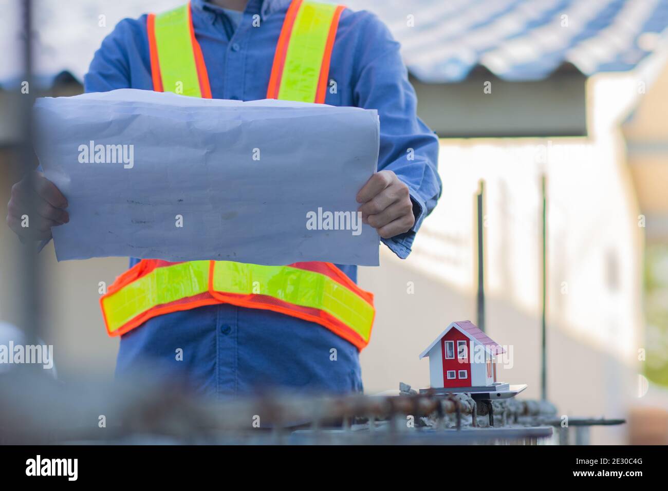 Engineer inspection on site building construction with blueprint Stock ...