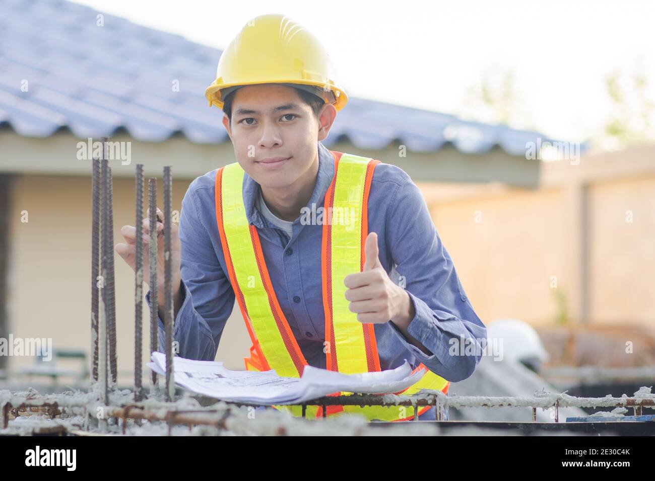 Engineer inspection on site building construction with blueprint Stock ...