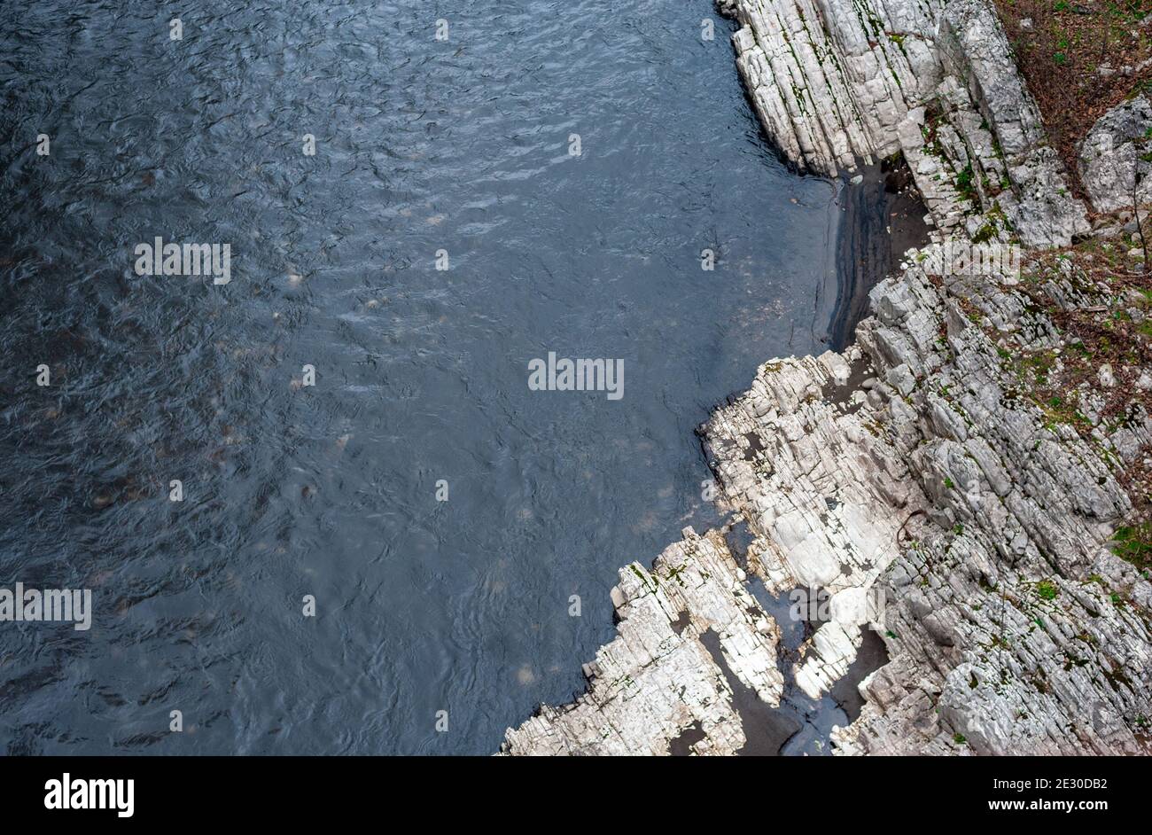 Natural texture: rock on the bank of a mountain river Stock Photo - Alamy