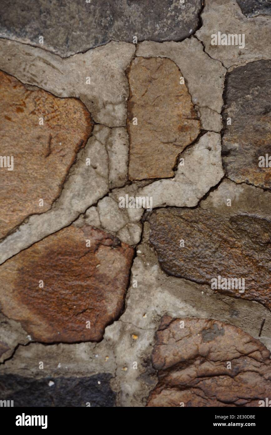 Mosaic road surface made of natural wild stones Stock Photo - Alamy