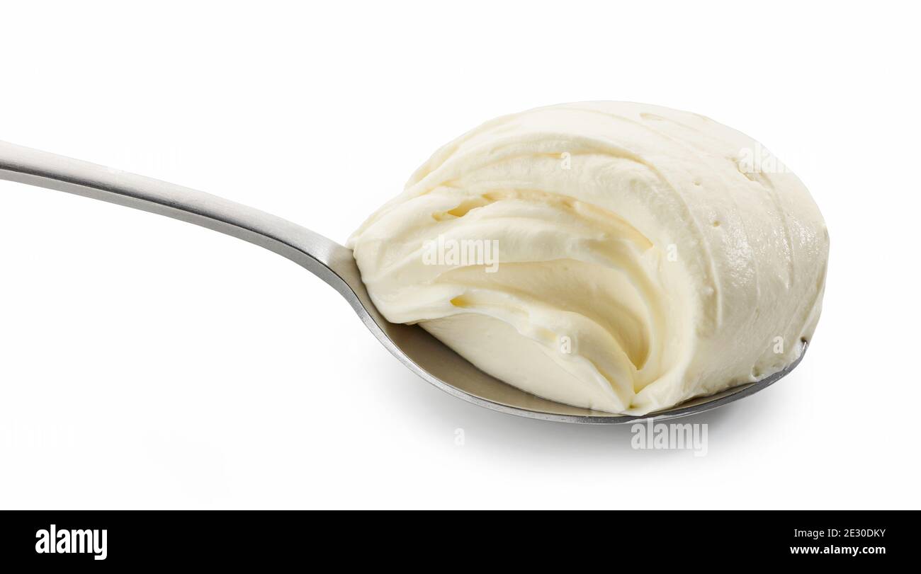 spoon of cream cheese isolated on white background Stock Photo - Alamy