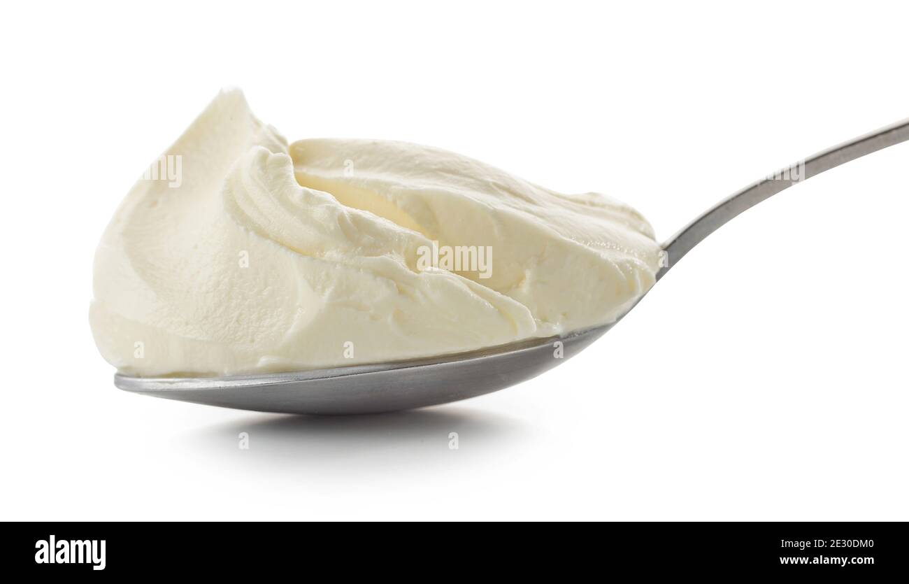 spoon of cream cheese isolated on white background Stock Photo - Alamy