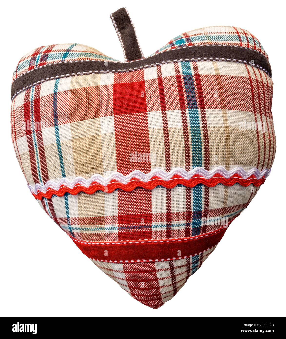 Close-up of a handmade fabric heart shape isolated on white background ...