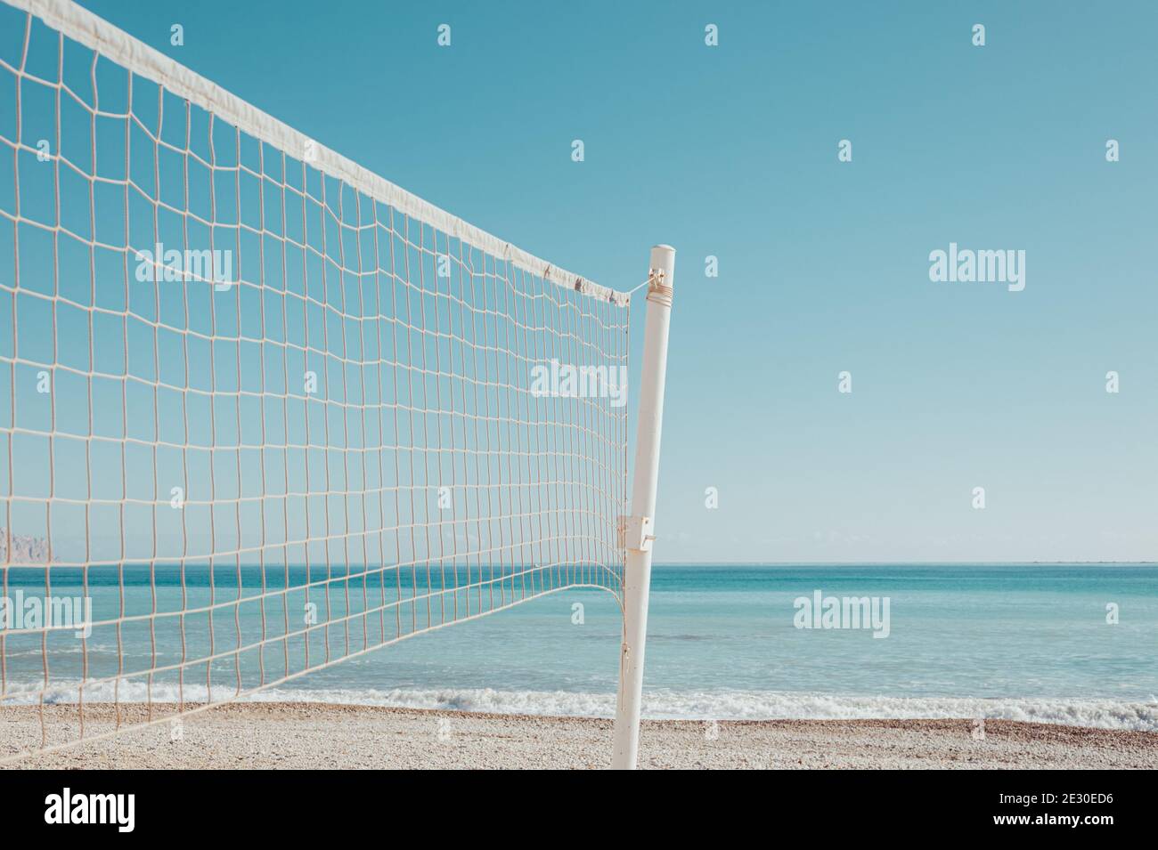 Volleyball net on tropical beach hi-res stock photography and images ...