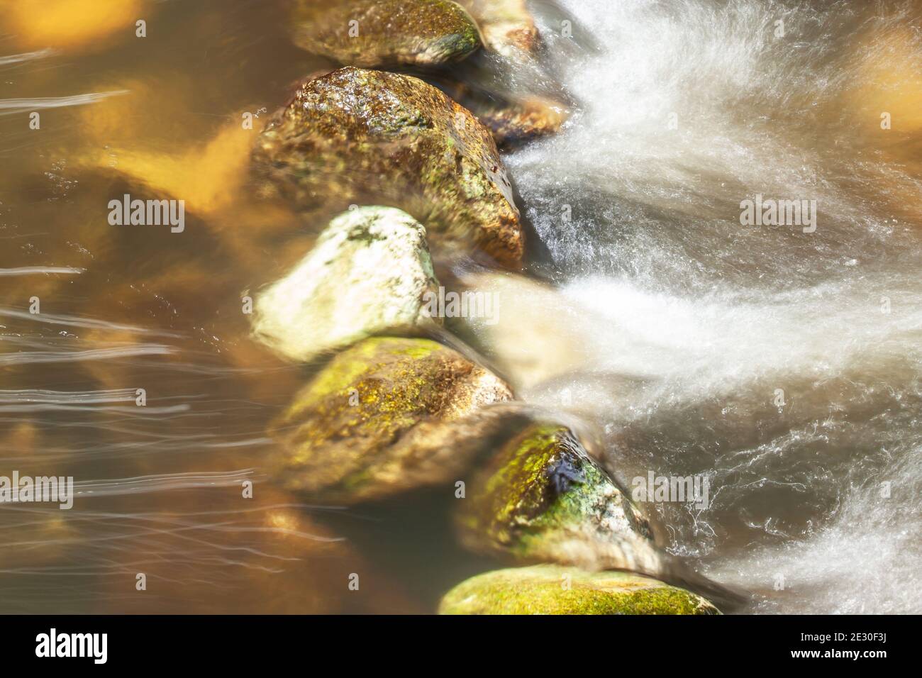 Shallow water over pebbles hi-res stock photography and images - Alamy