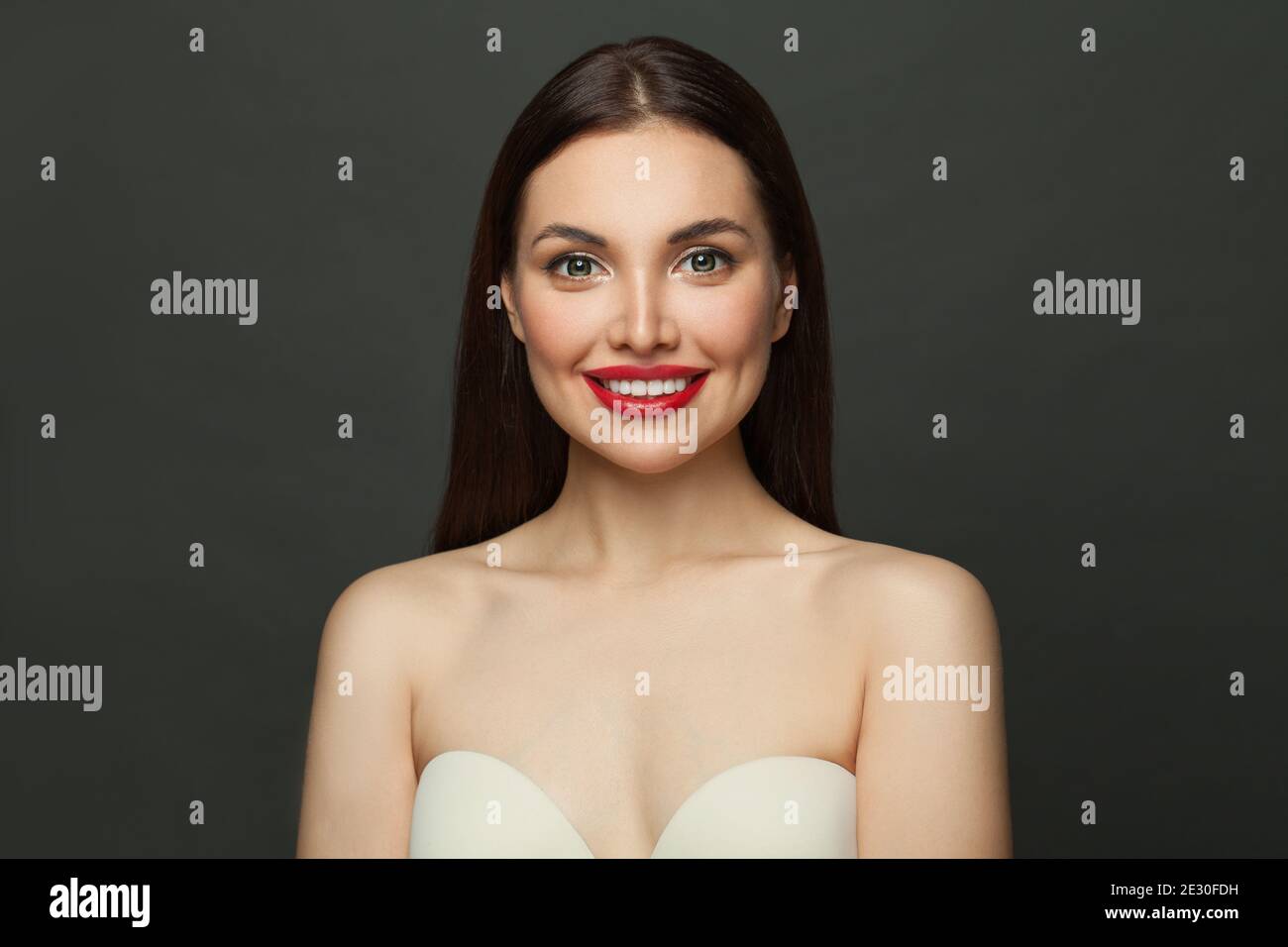 Pretty young model woman with clear skin and long healthy straight hair ...