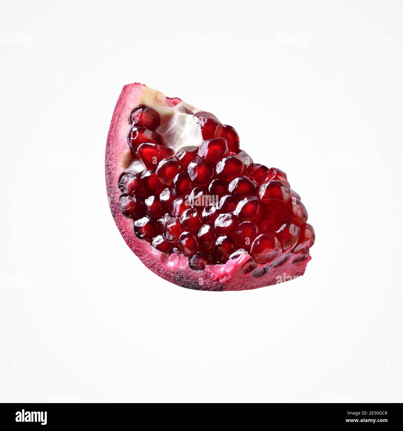 Subtropic fruit composition. Delicious colorful red piece pomergranate ...