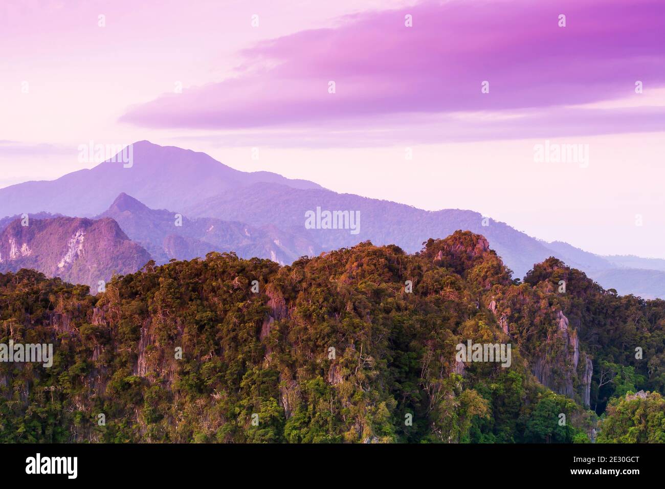 Scenery limestone mountains and dramatic clouds on sunset sky in the ...