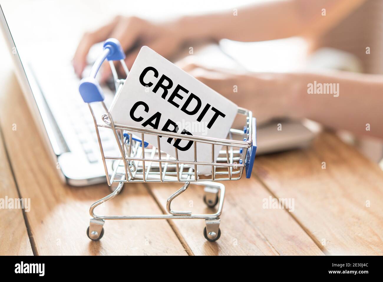 Top view of man using credit card for online shoping Stock Photo - Alamy