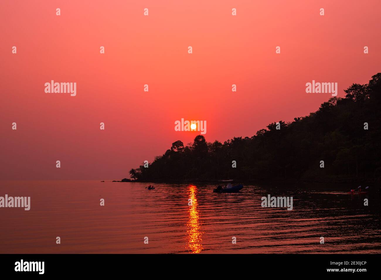 Bright red sunset by the sea on a tropical island in Asia Stock Photo ...