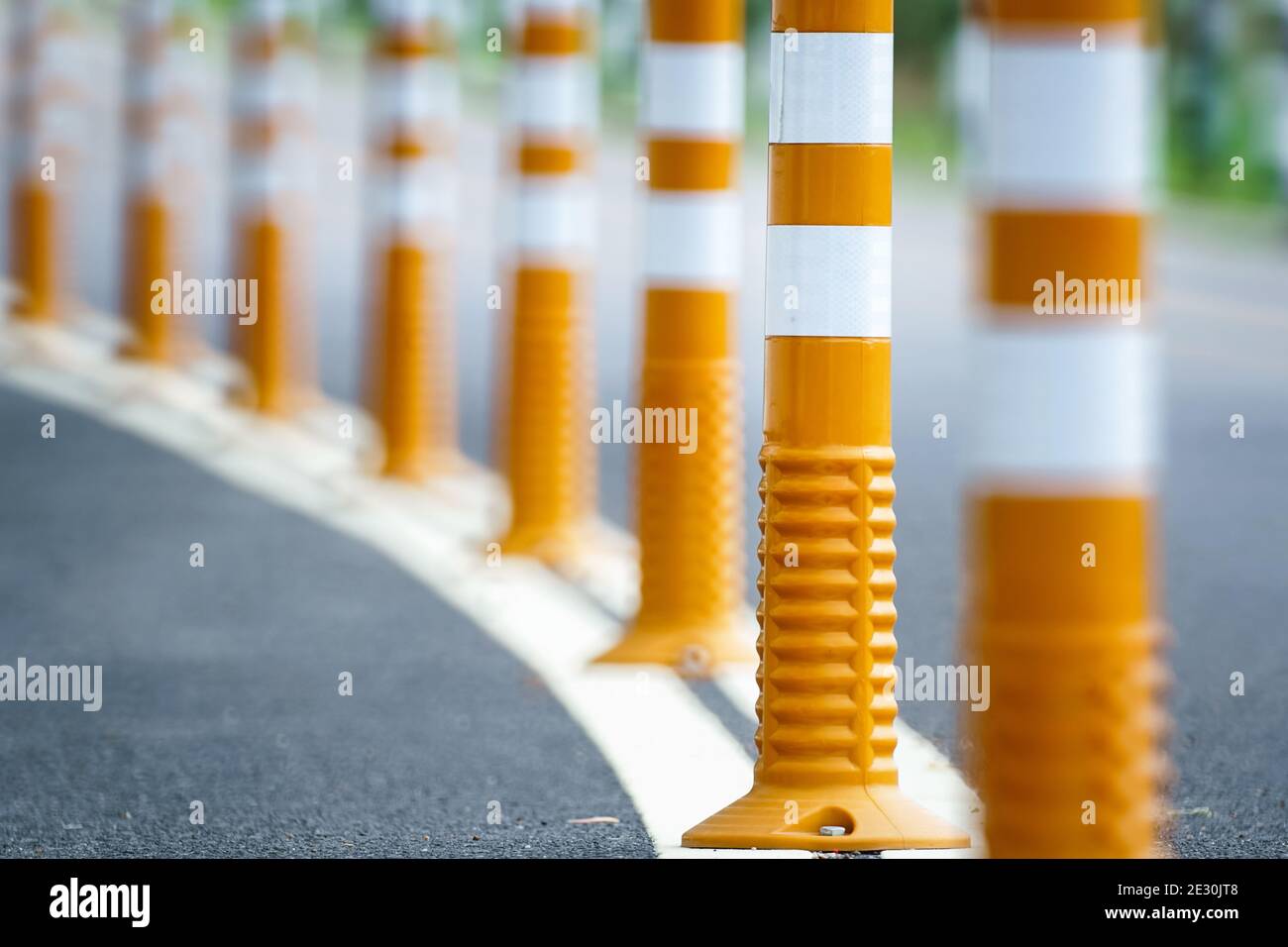 Flexible traffic bollard for bike lane Stock Photo - Alamy