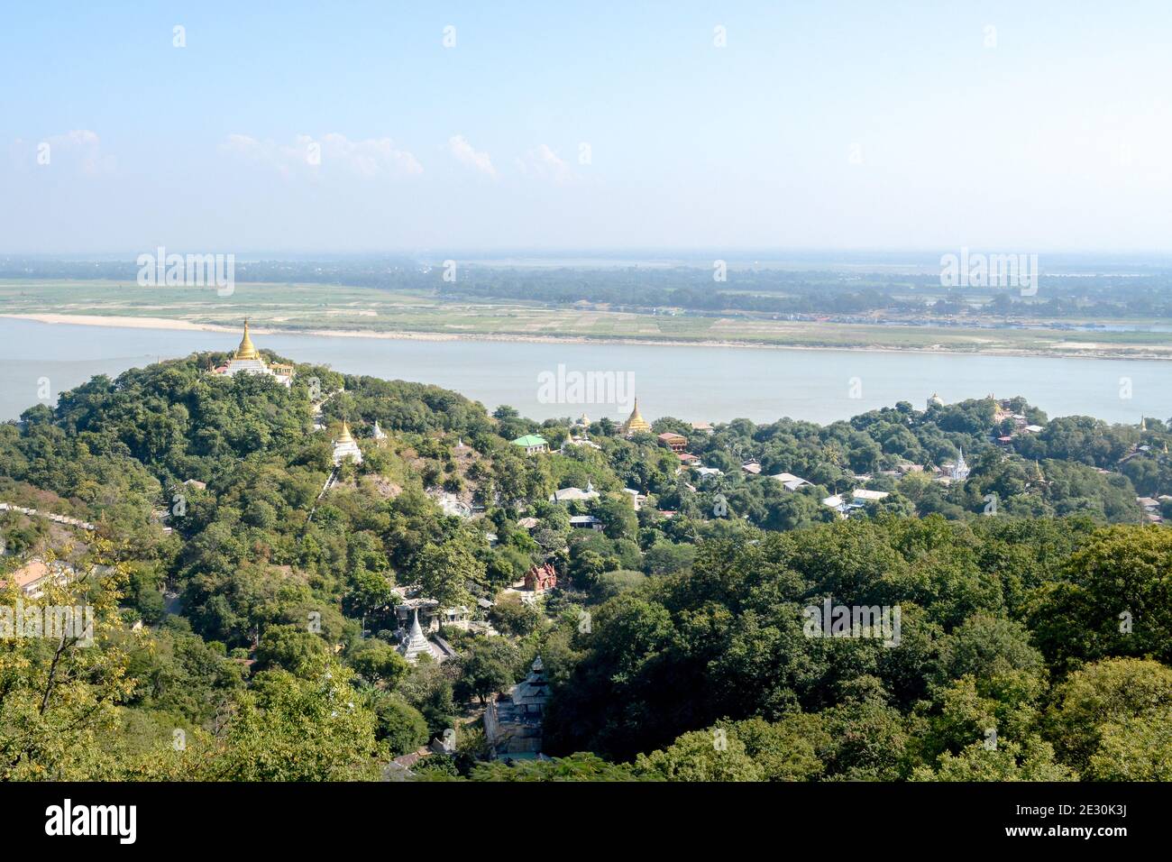 View of Sagaing with numerous Buddhist monasteries. Hills crowded with ...