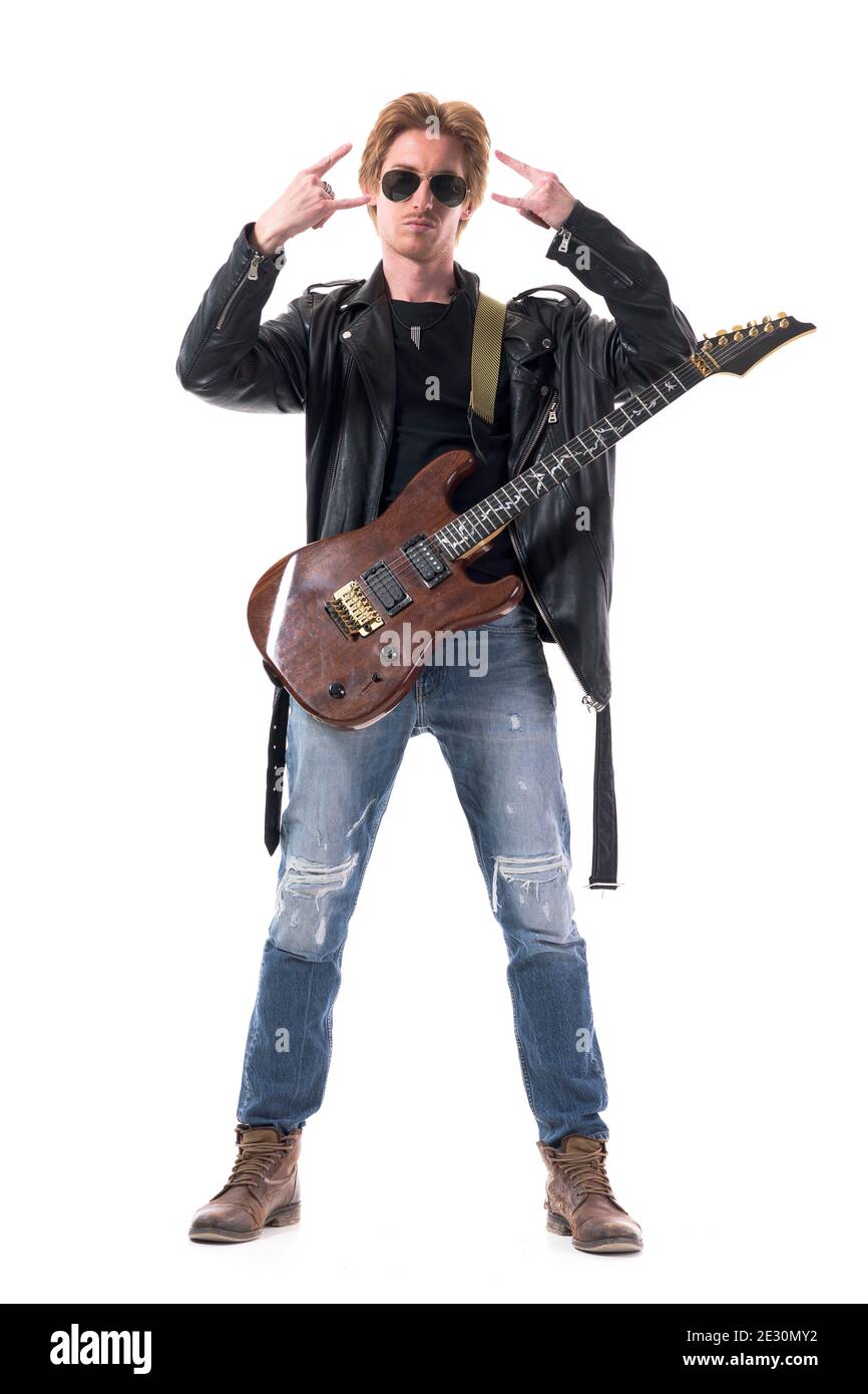 Cool macho stylish rock musician with electric guitar showing hard rock ...