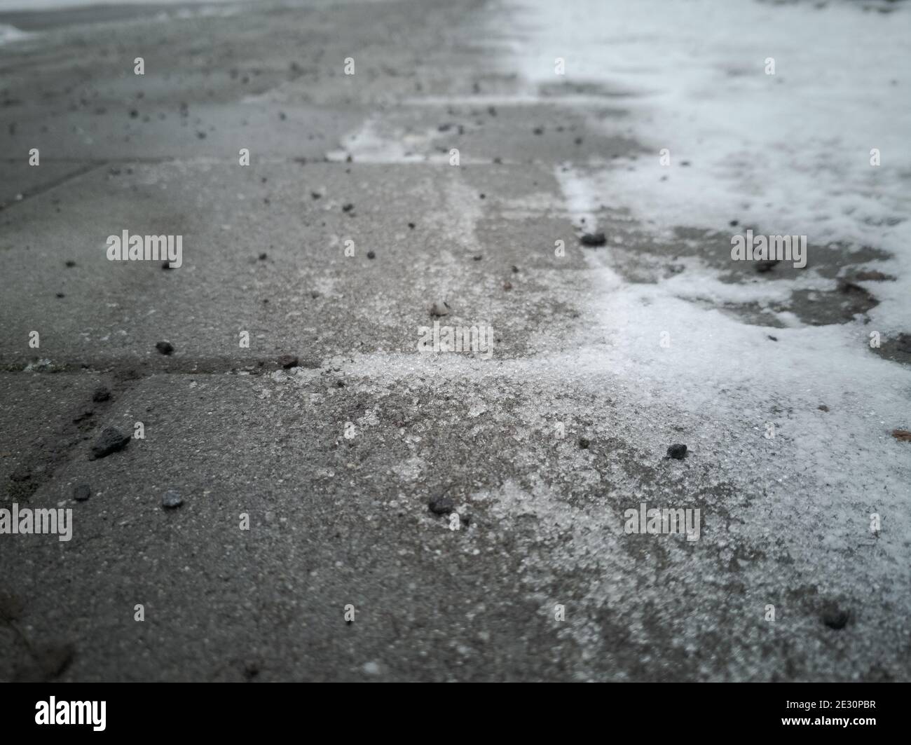 Salt on icy pavement hi-res stock photography and images - Alamy