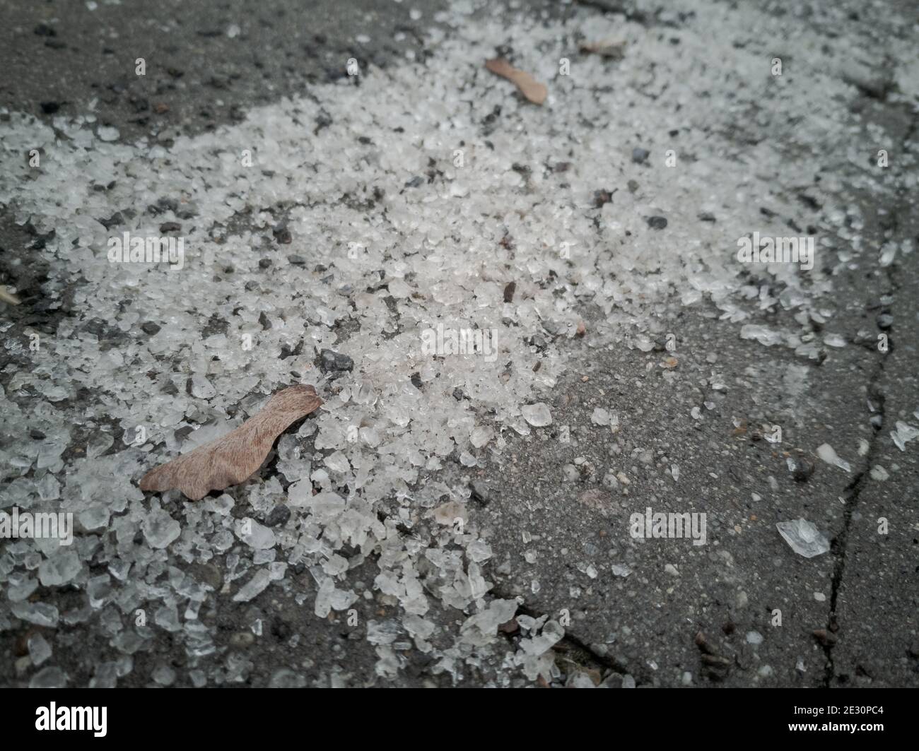 Salt on icy pavement hi-res stock photography and images - Alamy