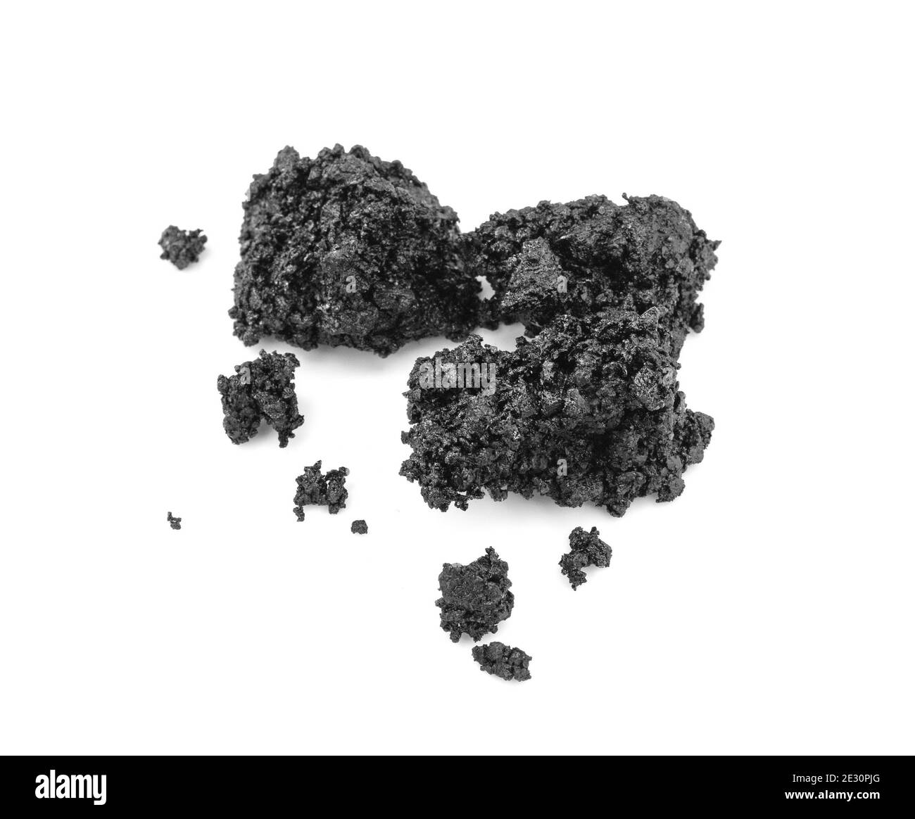 Piece of fresh asphalt isolated on white background. Pile of black raw ...