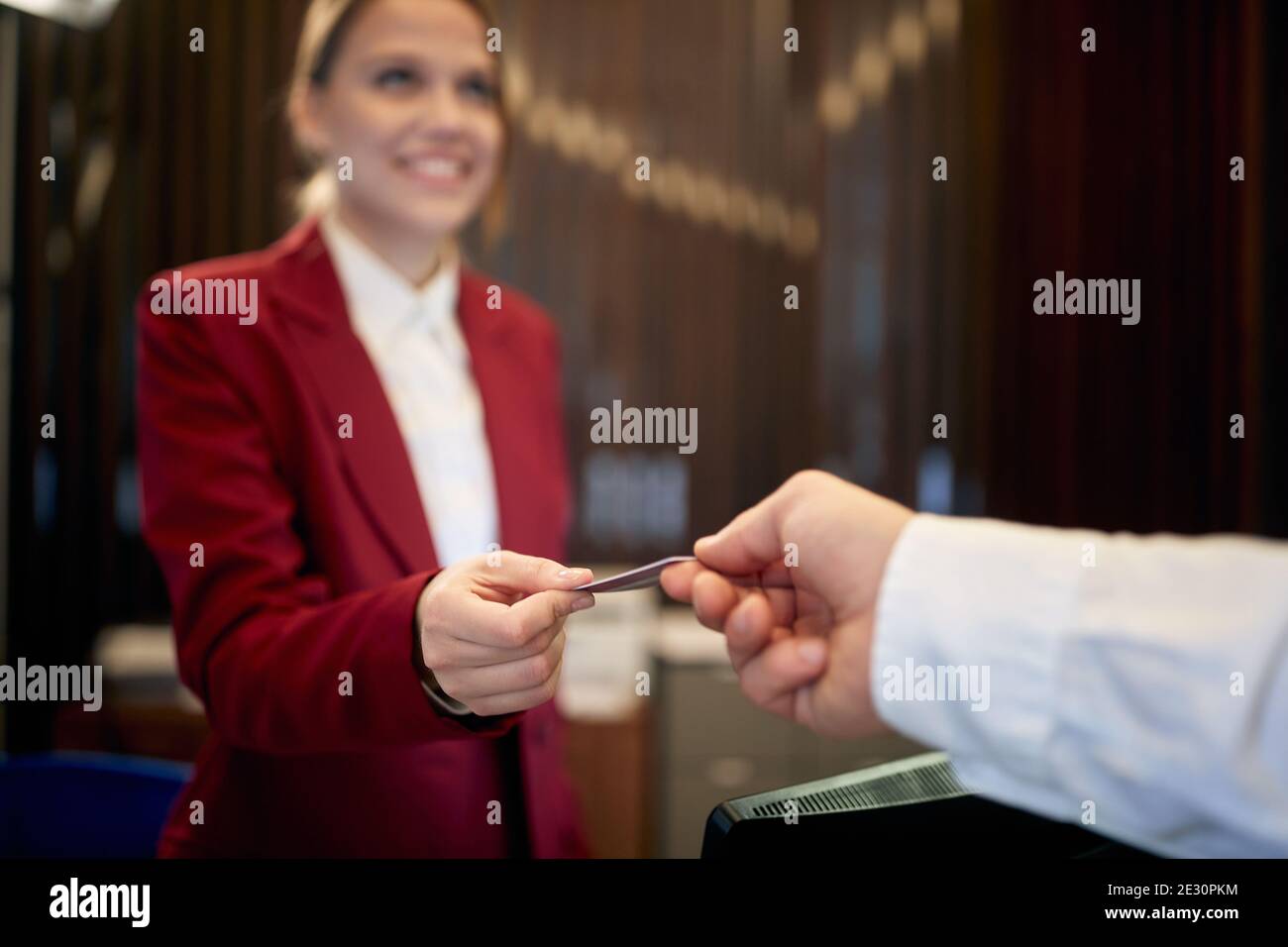 Receptionist work behind counter hi-res stock photography and images ...