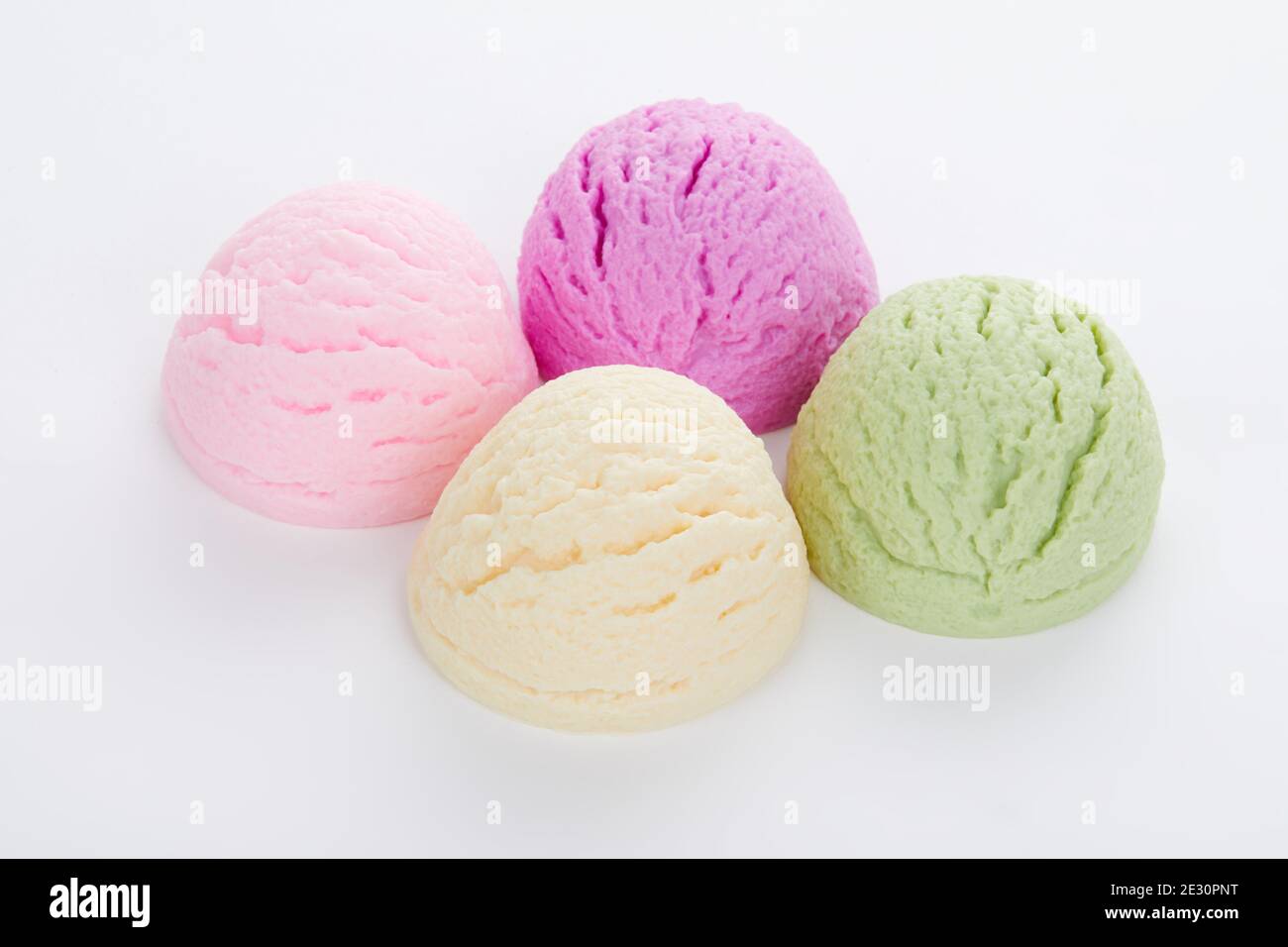 Closeup shot of various flavored delicious ice cream scoops isolated on ...