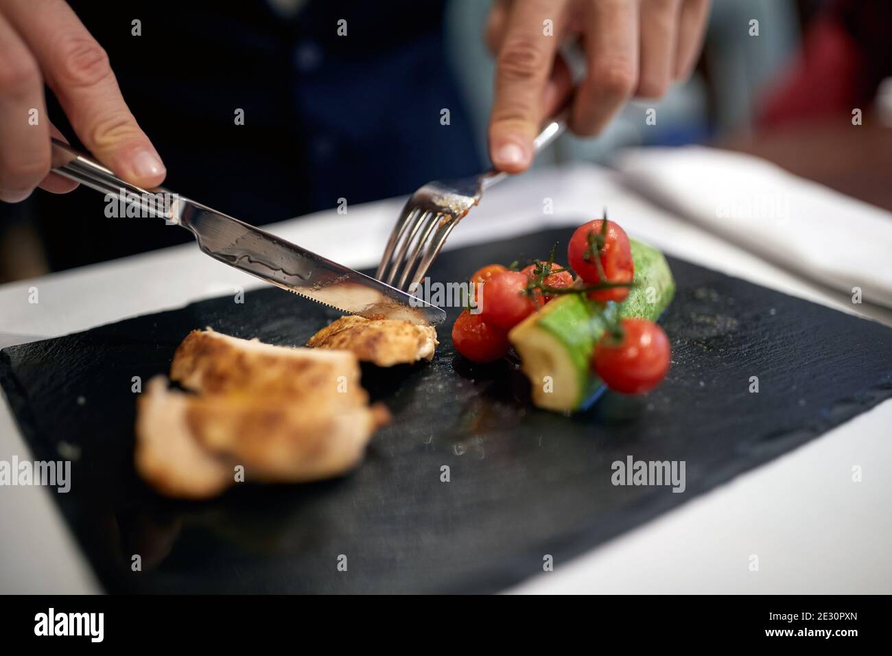 A man having a lunch in a pleasant atmosphere at a restaurant. Food ...