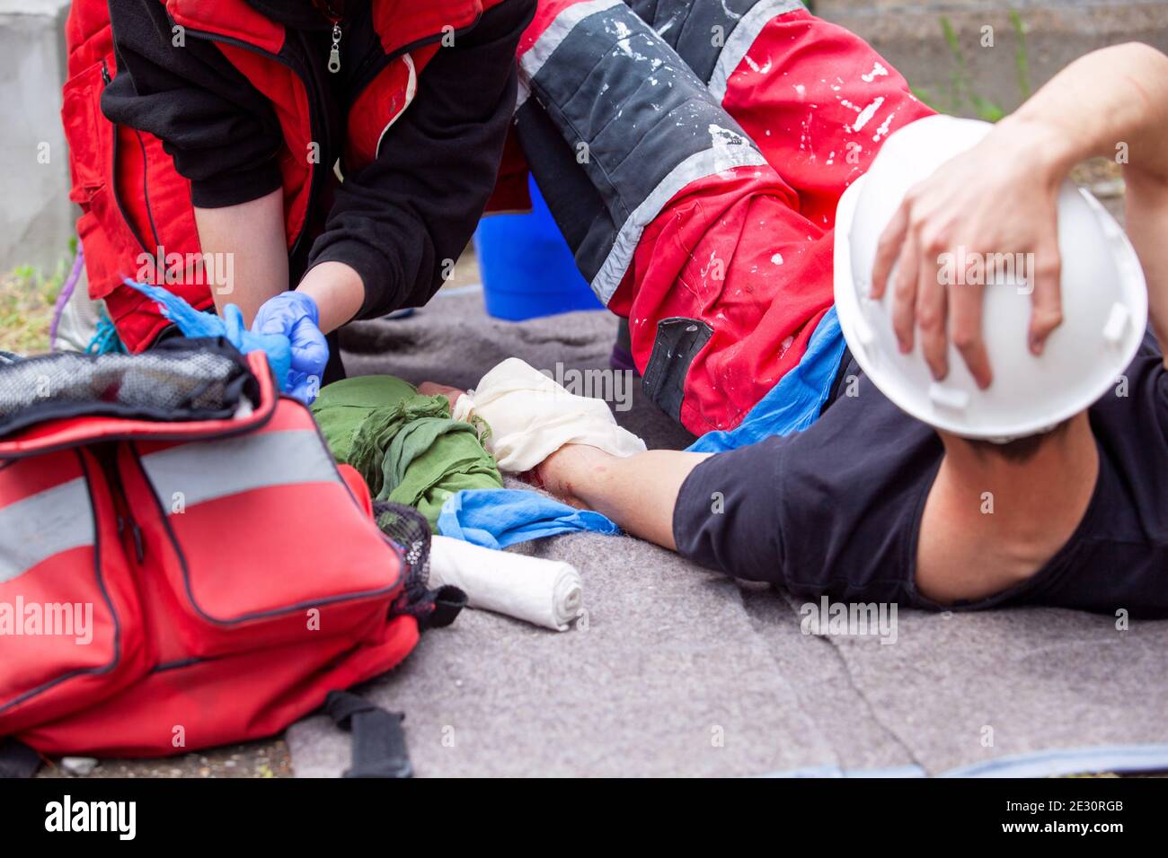 First aid training after accident on work at construction site Stock ...