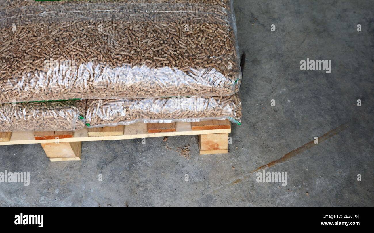 Heap of plastic bag with wooden pellets Stock Photo - Alamy