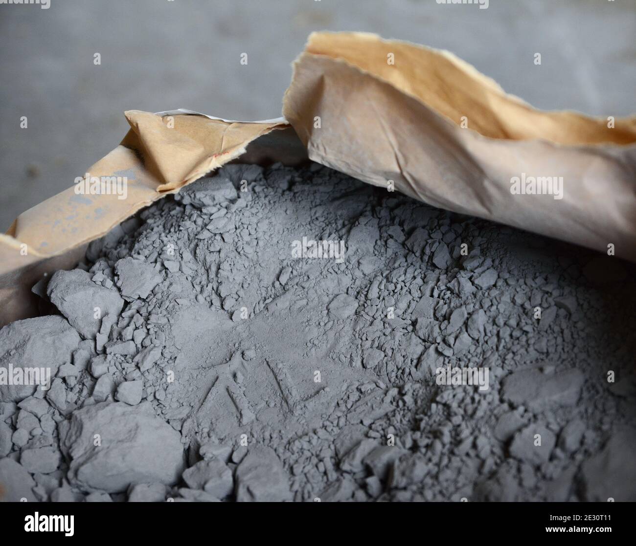 Cement powder in bag before mix. Concrete texture background Stock ...