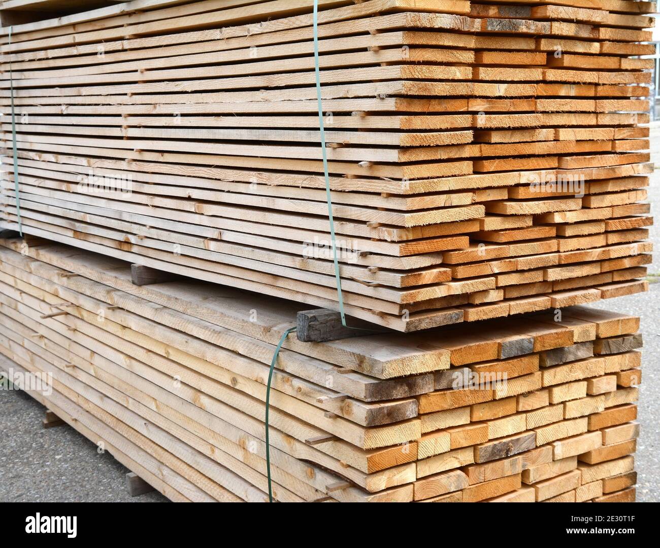 large stacks of wooden planks isolated on white background Stock Photo ...