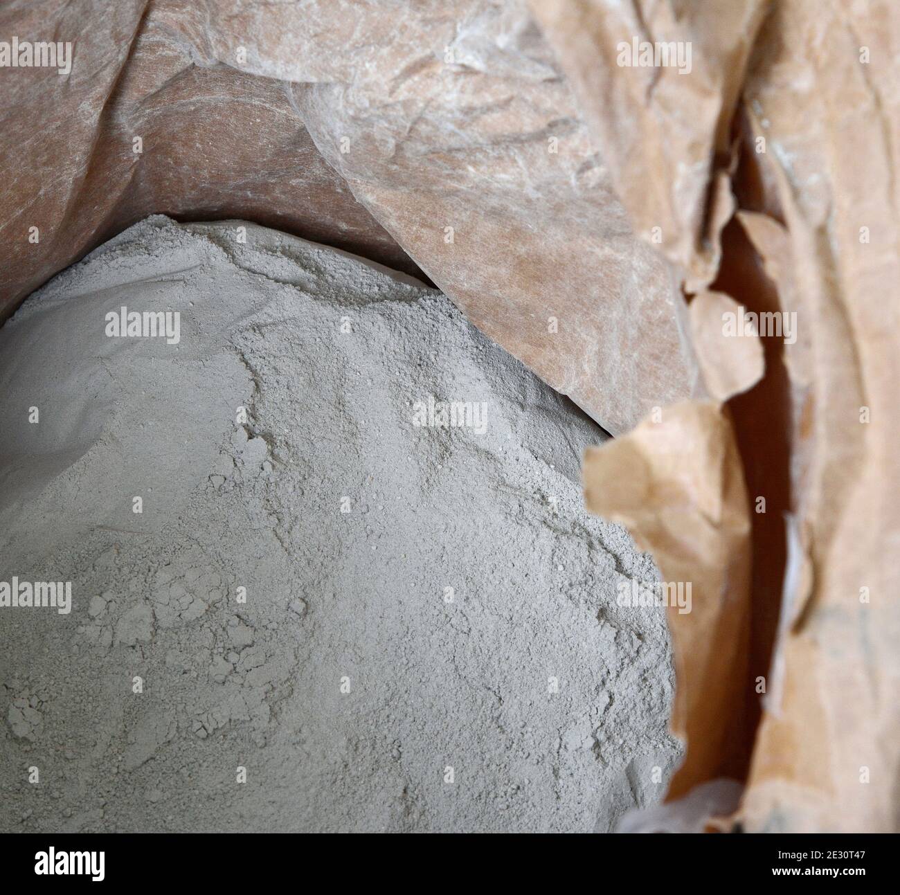 Cement powder in bag before mix. Concrete texture background Stock ...