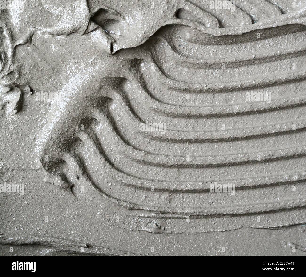Fresh concrete tehture. Wet mortar surface. Lined grey concrete as ...