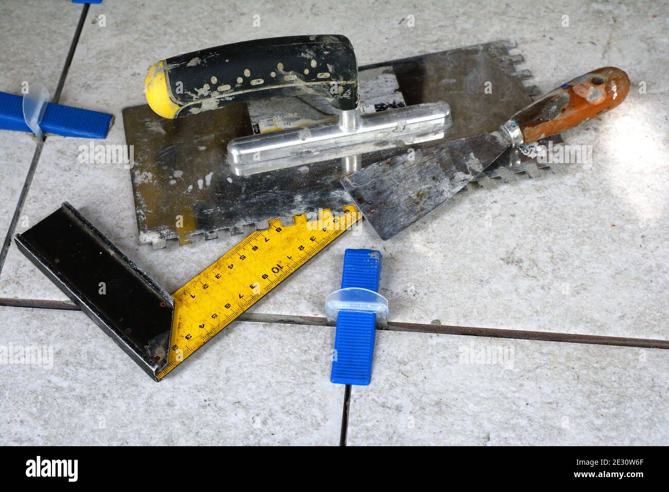 Tile levelling system with plastic clips, wedges and equipment Stock ...