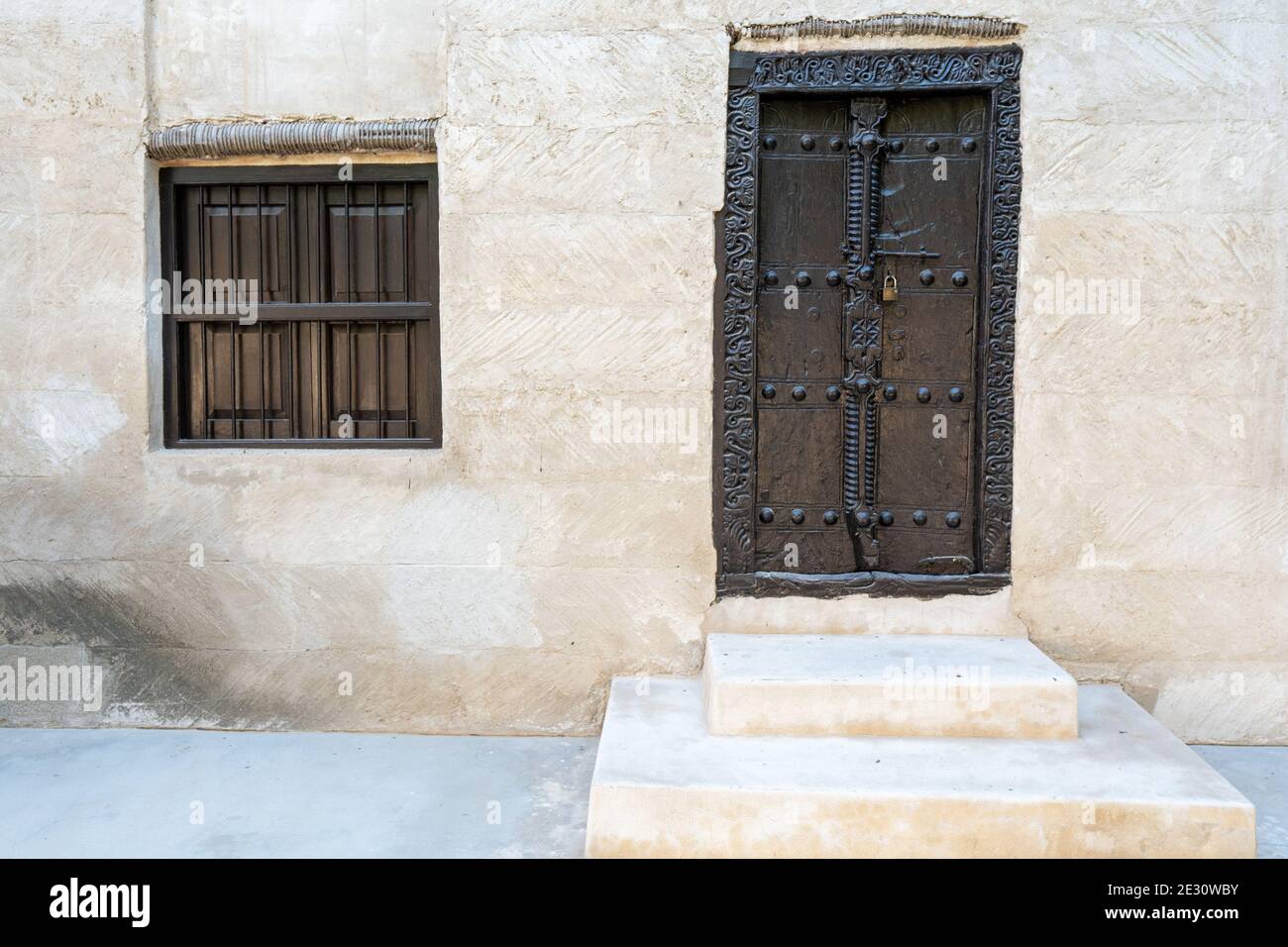 Ancient Museum doors and barred window of a middle eastern fort at the ...